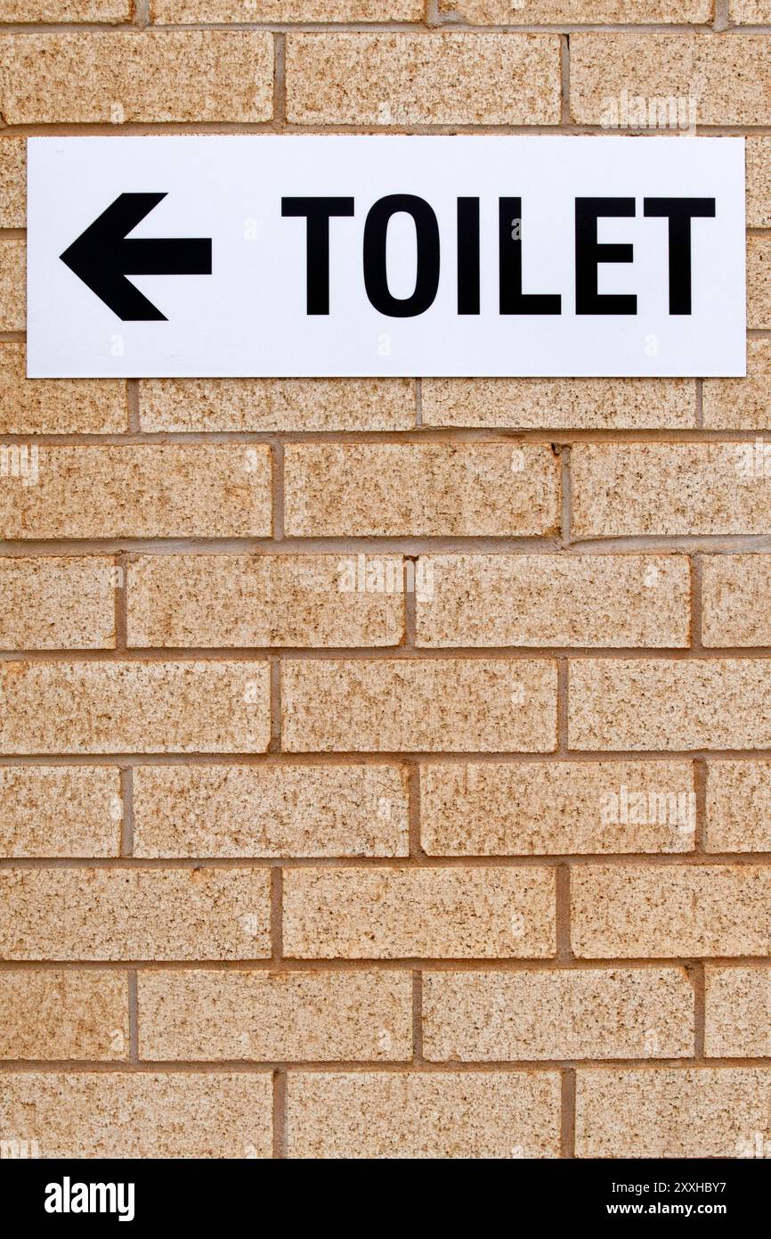 Toilet sign on a brick wall, Western Australia Stock Photo - Alamy