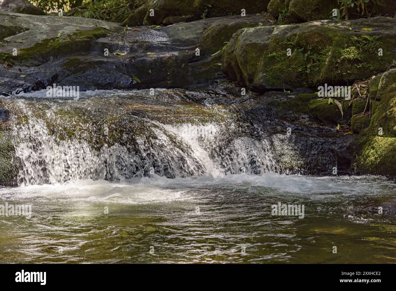 Small river and waterfall between the Itatiaia National Park rocks in ...