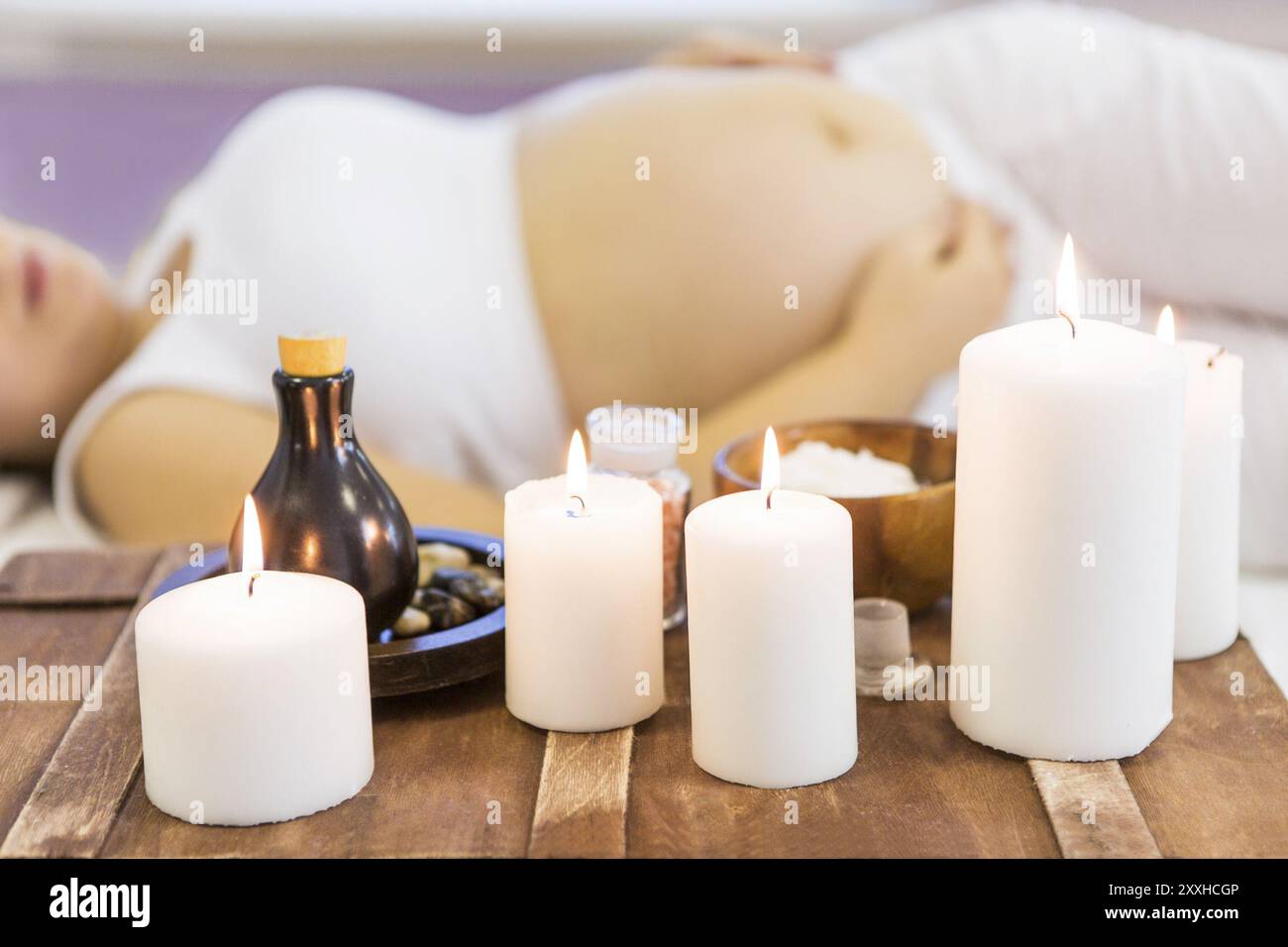 Young pregnant woman have massage treatment at spa salon Stock Photo - Alamy