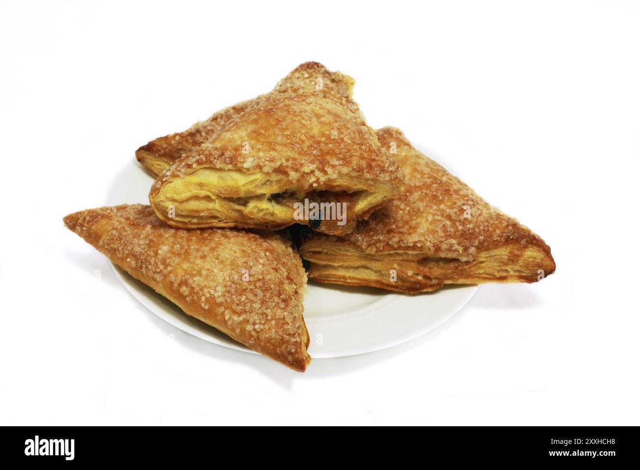 Puff pastry with apple close up isolated on white Stock Photo - Alamy