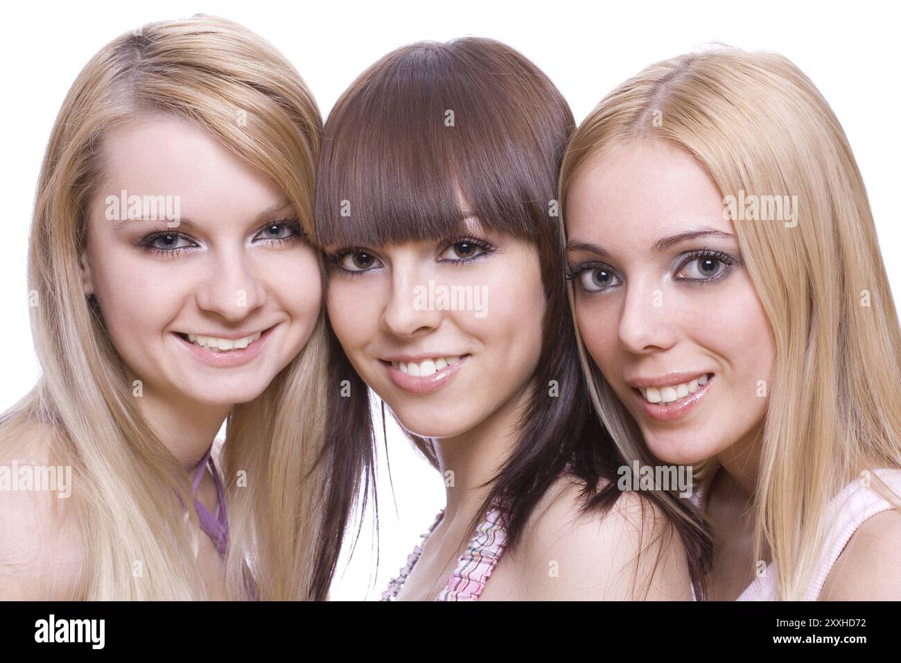 Three girls together on a white background Stock Photo - Alamy