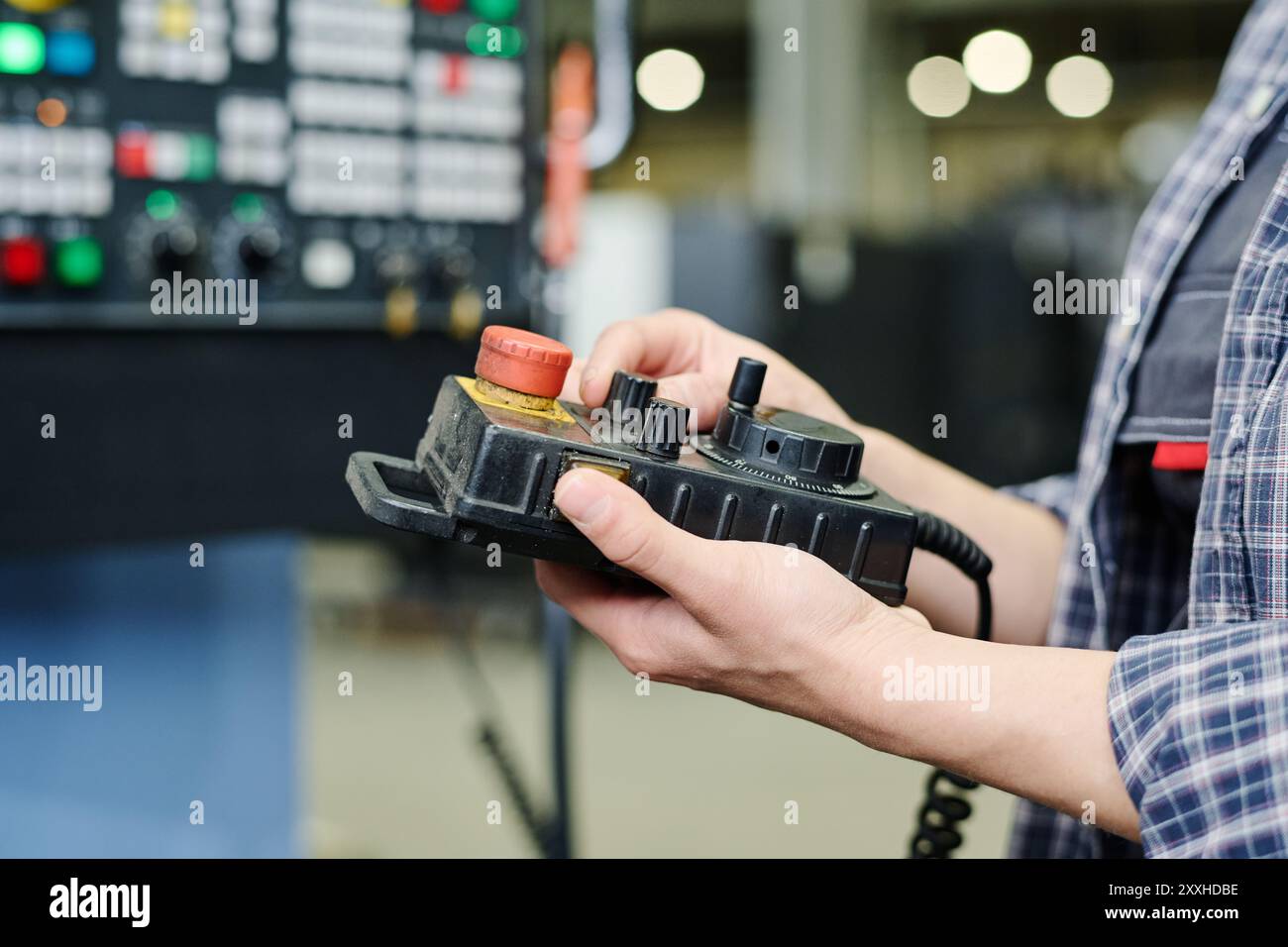 Worker holding control panel factory hi-res stock photography and ...