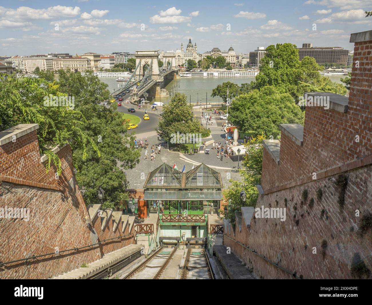Viewpoint showing a cable car station, the bridge and the city centre ...