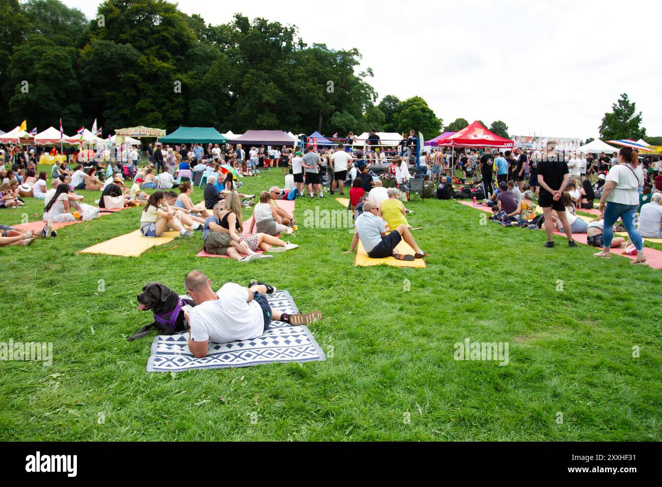 Magic of Thailand, people gathering to see the show, Earlham Park ...