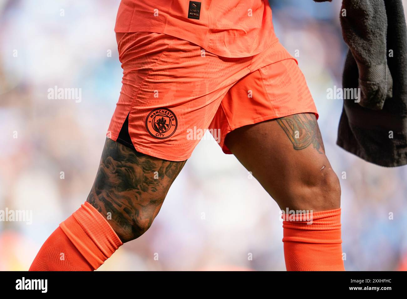 Tattoos cover the right leg of Manchester City's goalkeeper Ederson ...