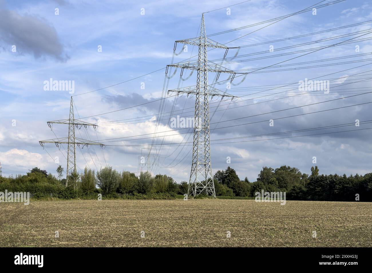 Two overhead line pylons High-voltage pylons Power pylons Support ...