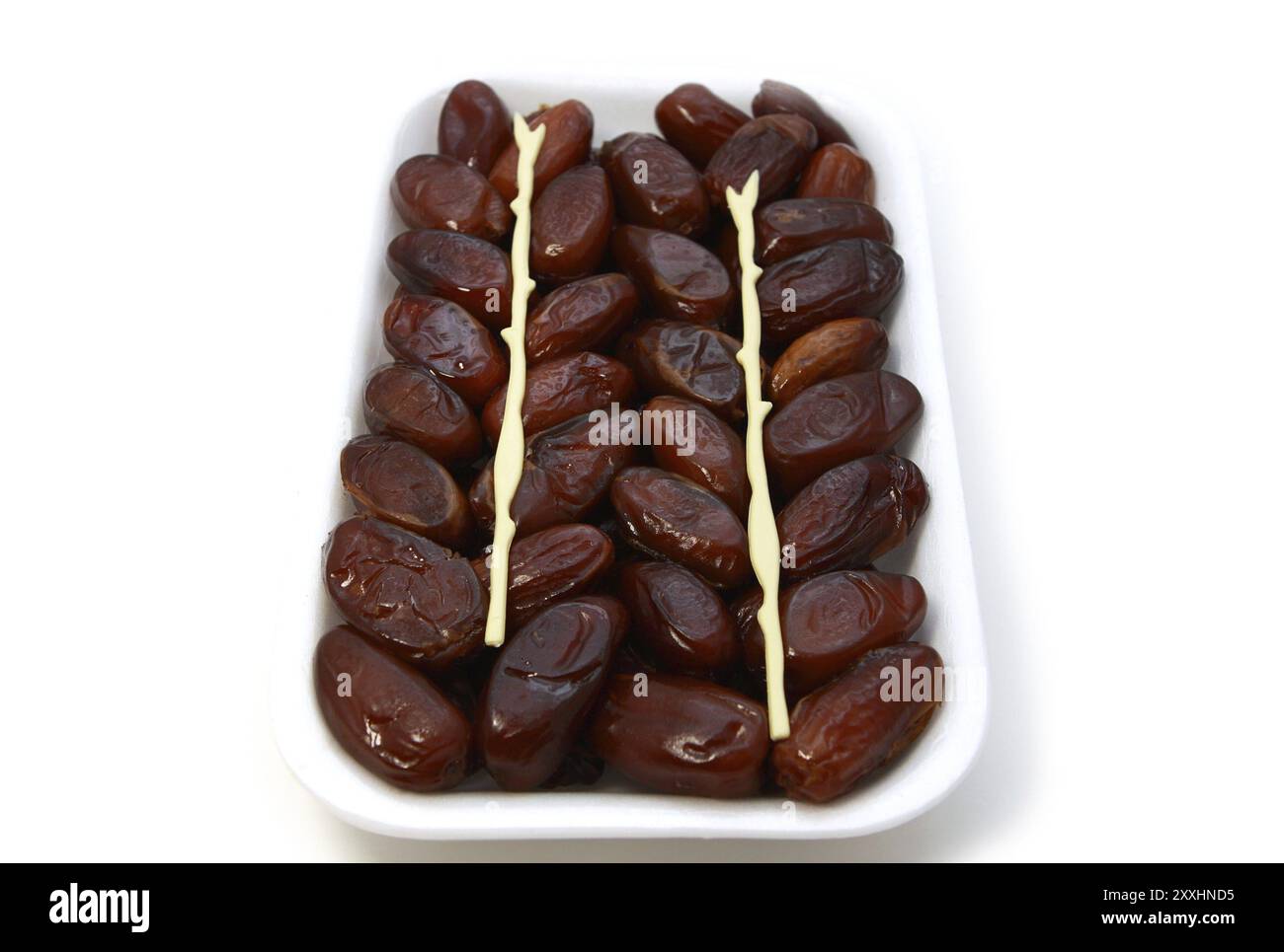 Many dried figs in pack over white Stock Photo - Alamy