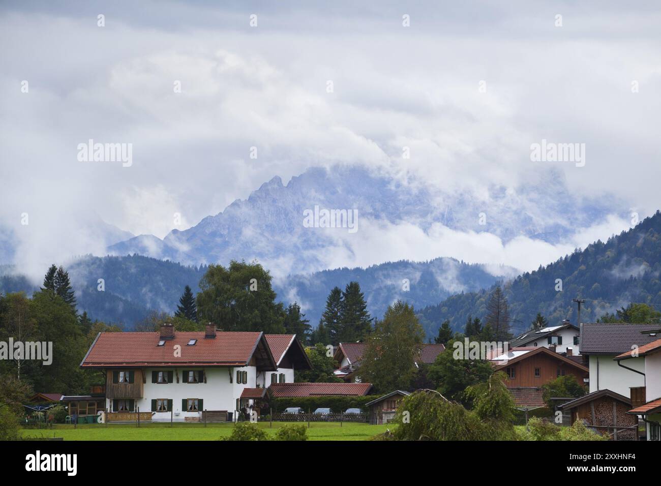 Cozy alpine town Wallgau in morning mist, Germany, Europe Stock Photo ...