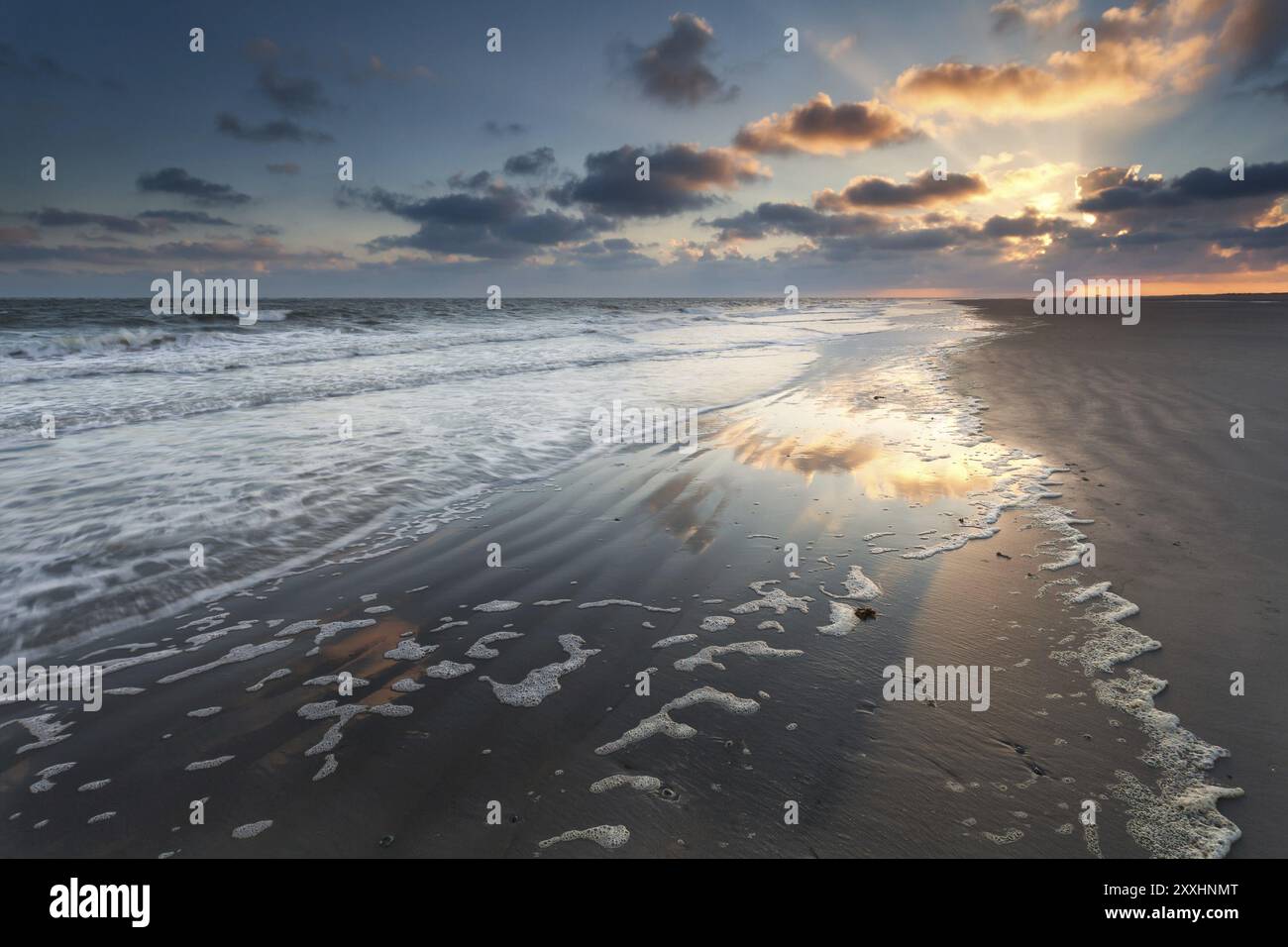 Dramatic sunrise over North sea beach, Netherlands Stock Photo - Alamy