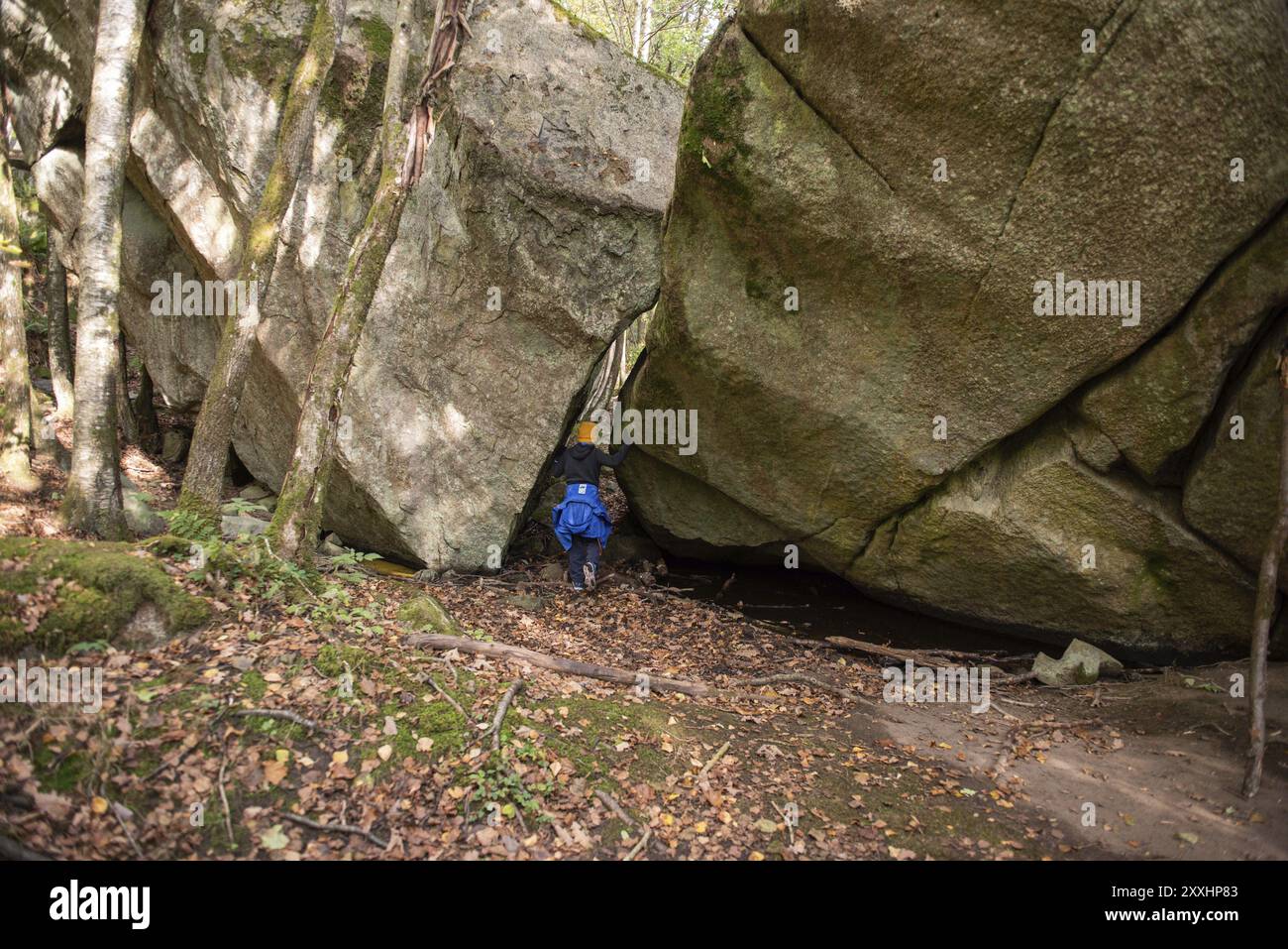 Large boulder and person hi-res stock photography and images - Alamy