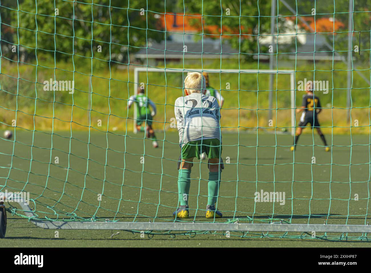 Child playing soccer goalie hi-res stock photography and images - Alamy