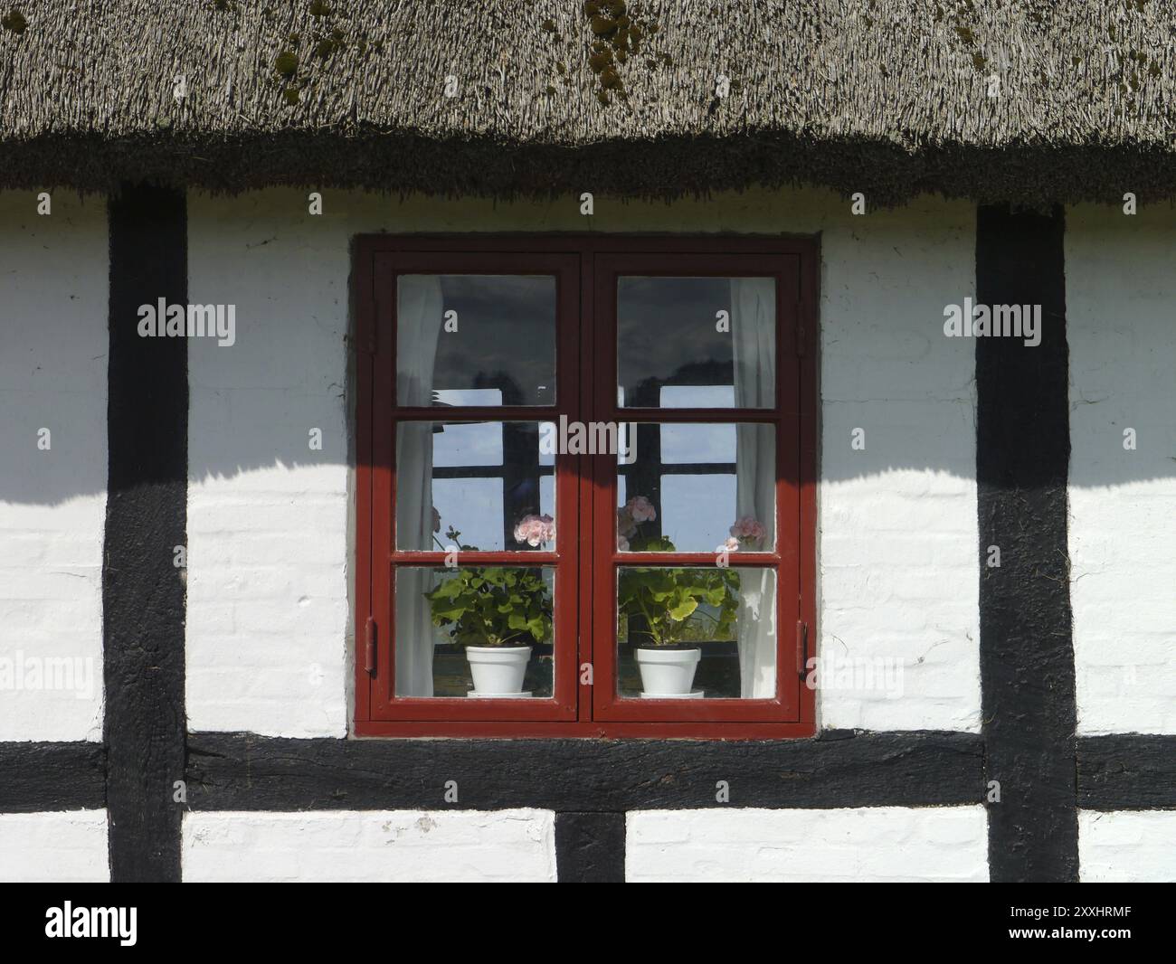 Windows in half-timbered house with thatched roof Stock Photo - Alamy