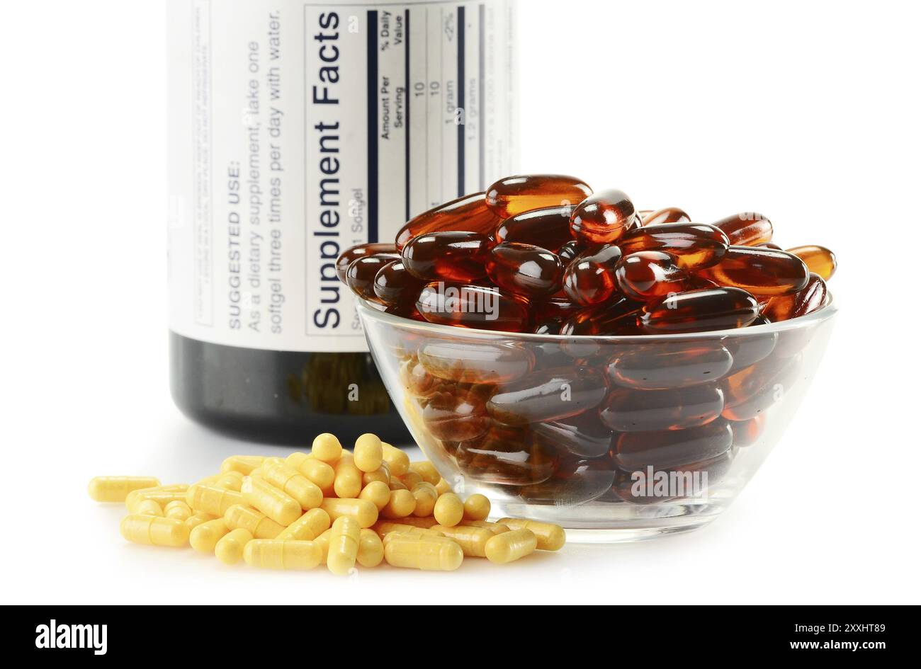 Composition with dietary supplement capsules and containers Stock Photo ...