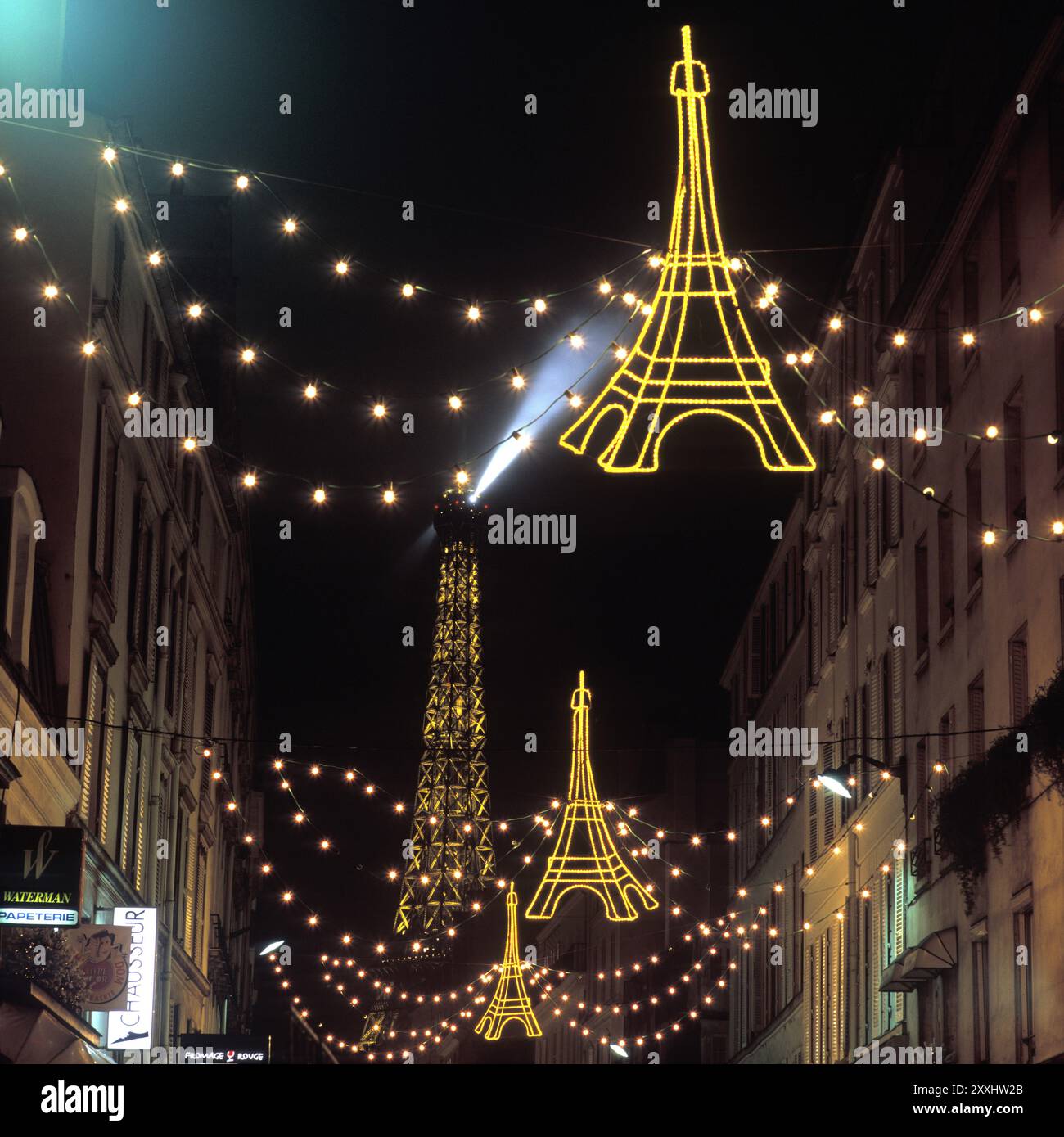 Christmas lights with the Eiffel Tower in the background, Paris, France ...