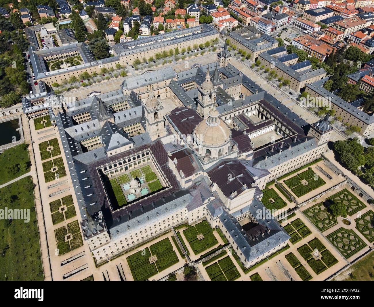 Large historic monastery with several courtyards, surrounded by parks ...