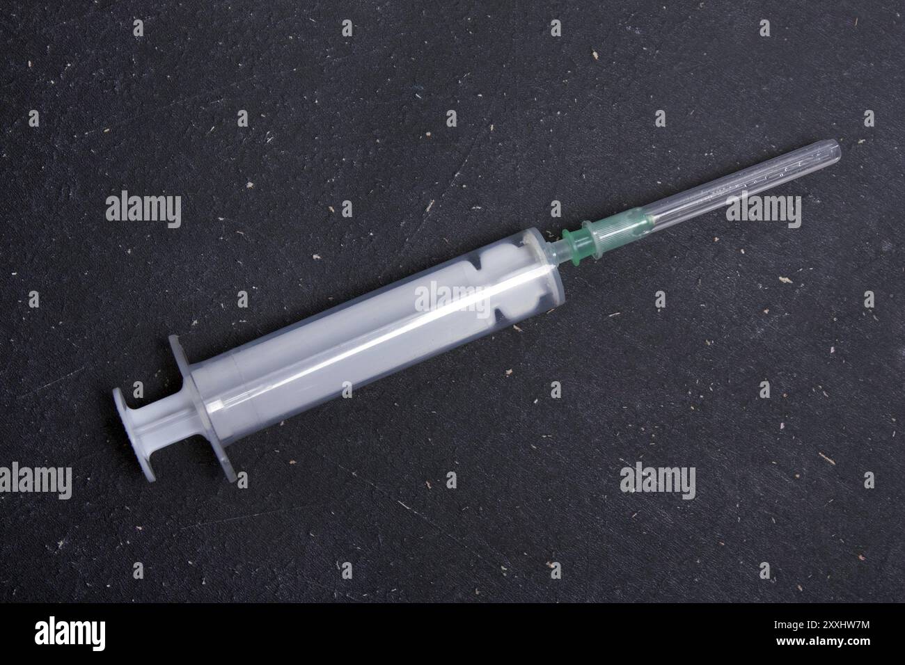 Medicine vaccination injecting disposable syringe Stock Photo - Alamy