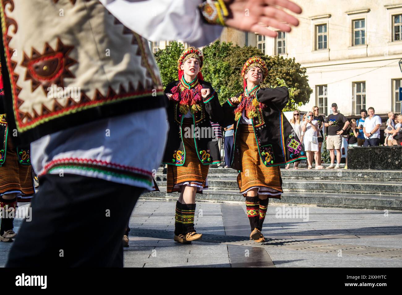 Lviv, Ukraine, August 24, 2024 A group of dancers dressed in traditional Ukrainian outfits take ...