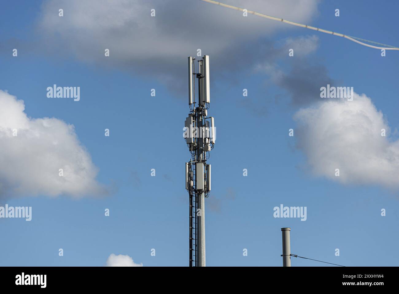Tower with different types of cellphone transmitters and antennas Stock Photo - Alamy