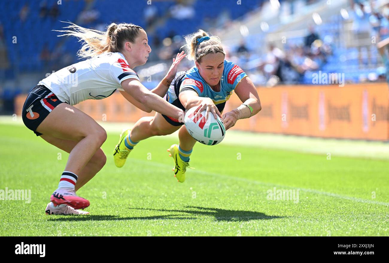 Gold Coast, Australia. 25th Aug, 2024. Emily Bass of the Titans scores ...