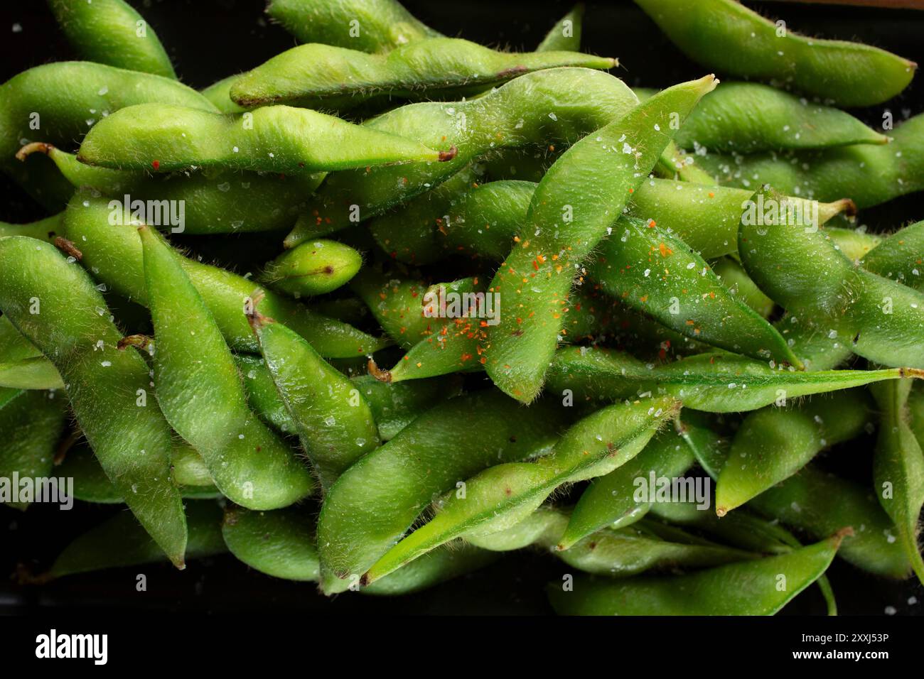 A top down view of a plate of edamame Stock Photo - Alamy