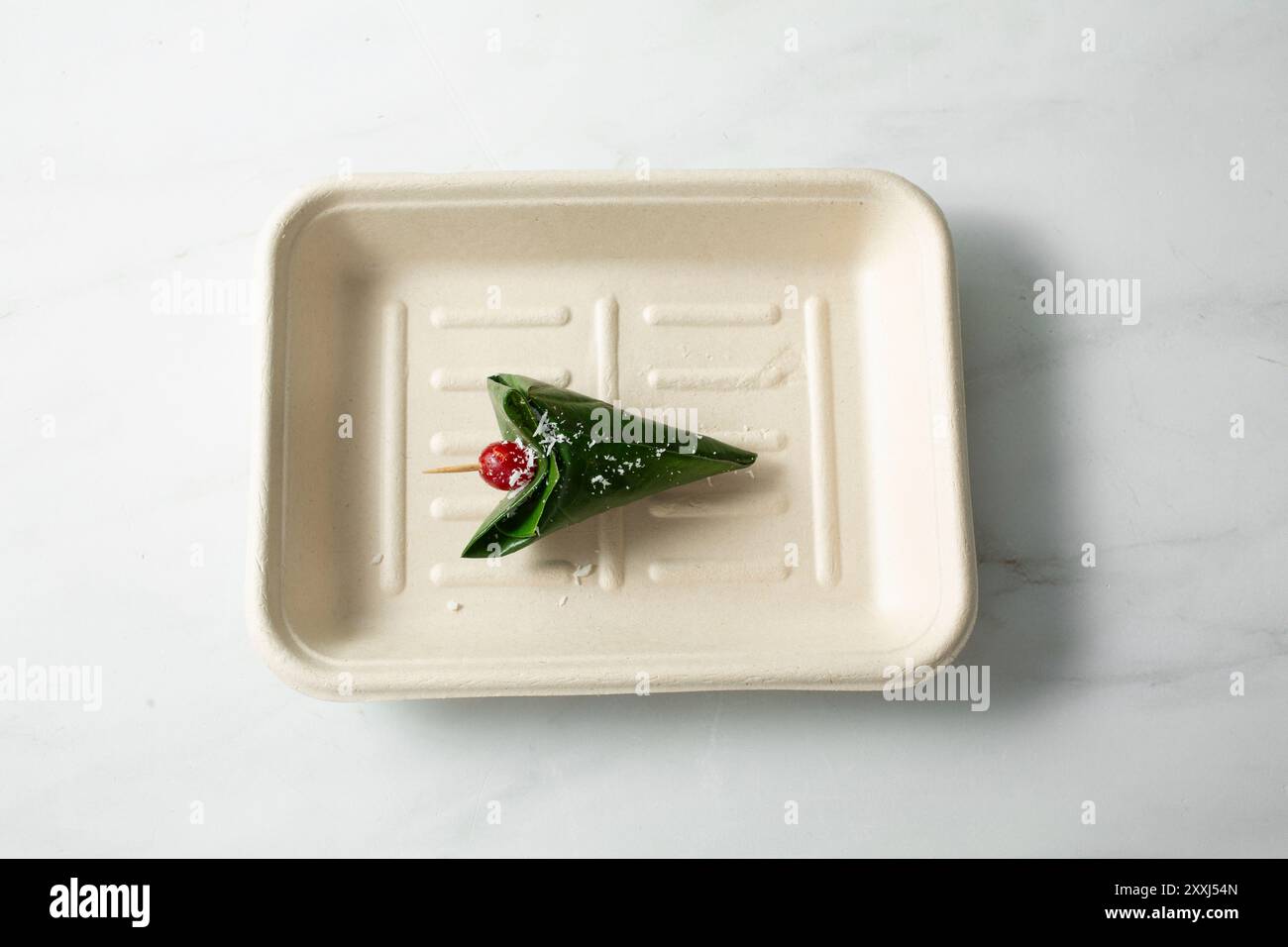 A top down view of an Indian betel leaf wrap dessert known as paan ...