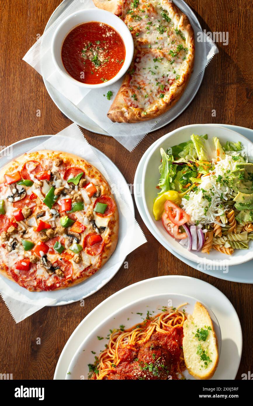 A top down view of a variety of Italian entrees Stock Photo - Alamy