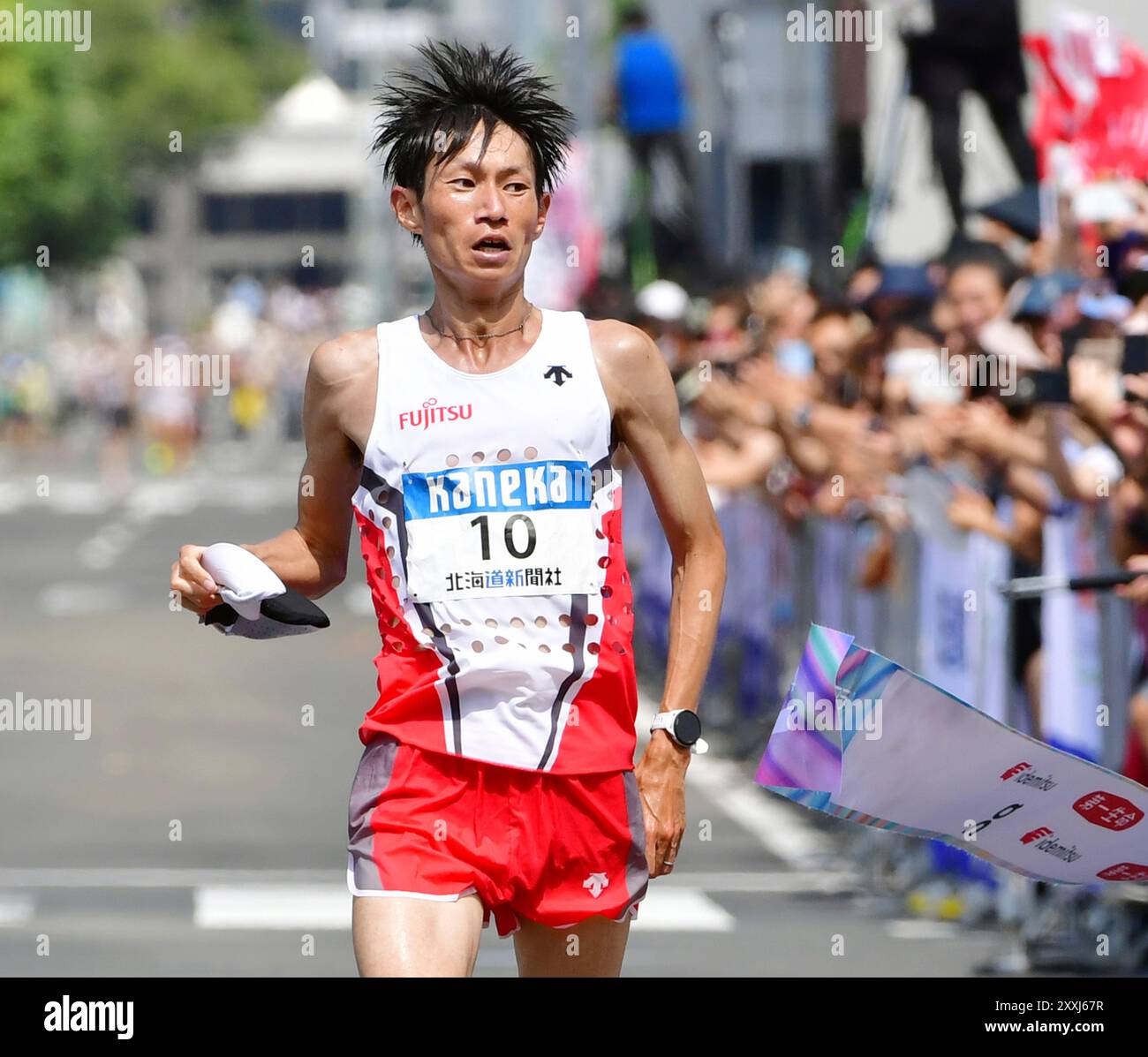 Shogo Nakamura of Japan crosses the finish line during men's Hokkaido ...