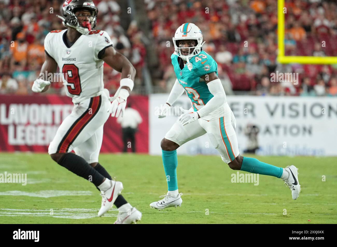 Miami Dolphins cornerback Jason Maitre (43) covers Tampa Bay Buccaneers ...
