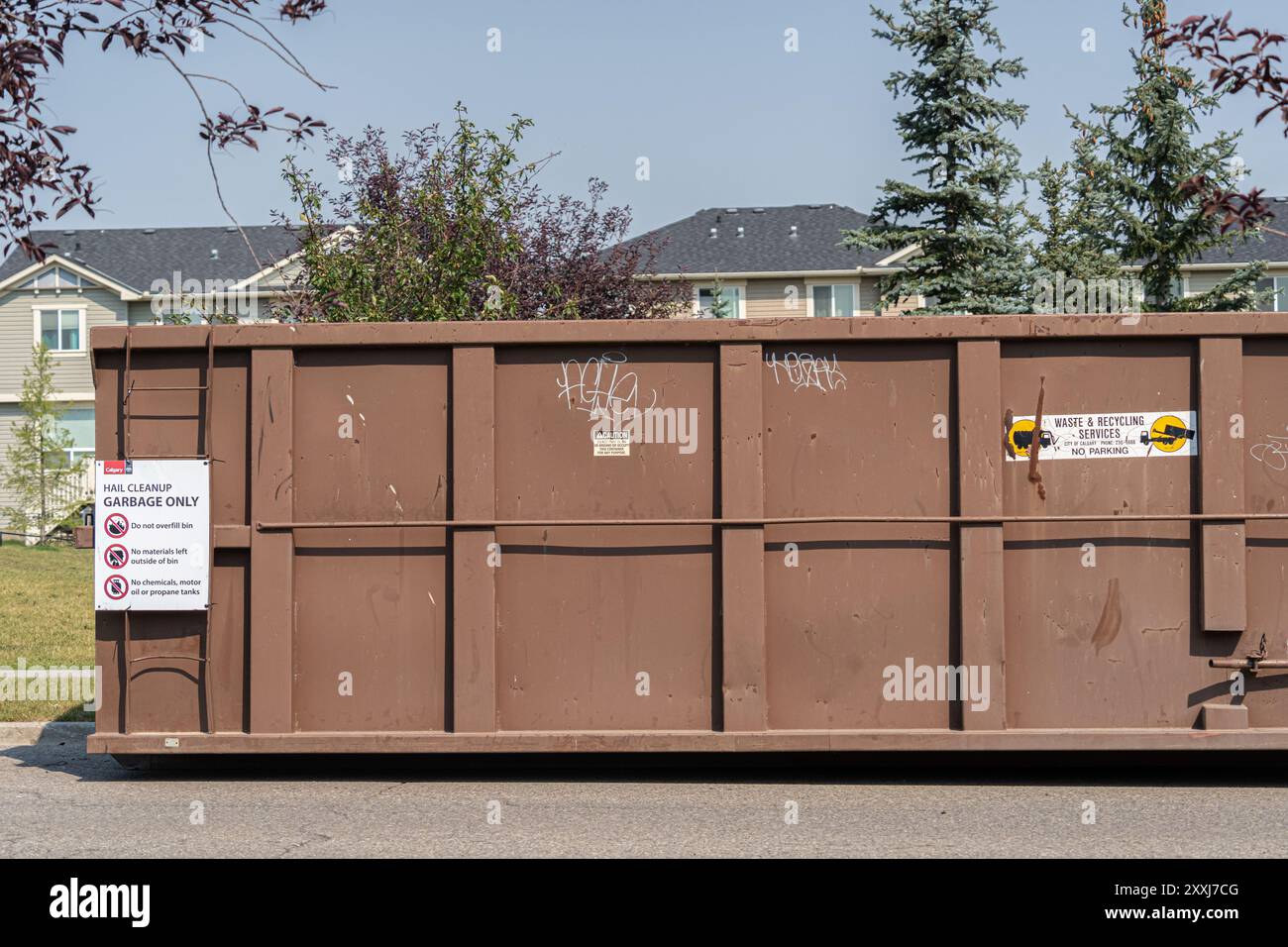 August 23 2024 - Calgary Alberta Canada - Garbage Dumpster to collect ...