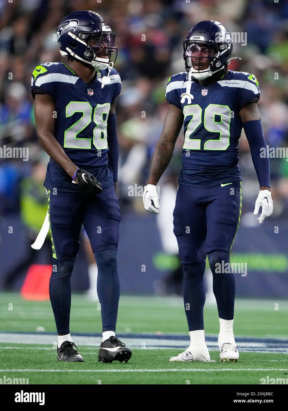 Seattle Seahawks cornerback Nehemiah Pritchett (28) and cornerback D.J ...