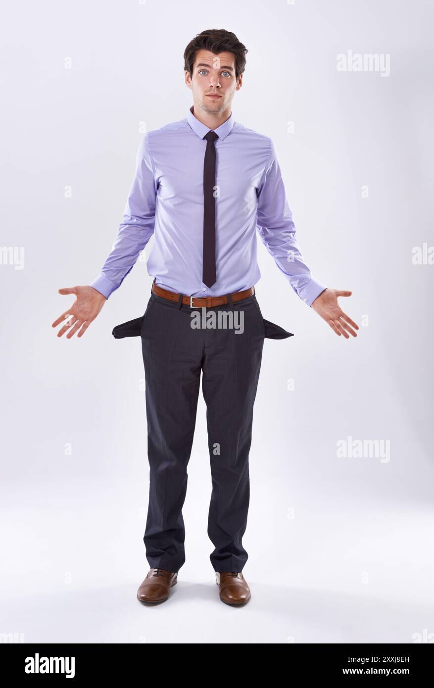 Portrait, poor and businessman with empty pockets for bankruptcy, debt ...