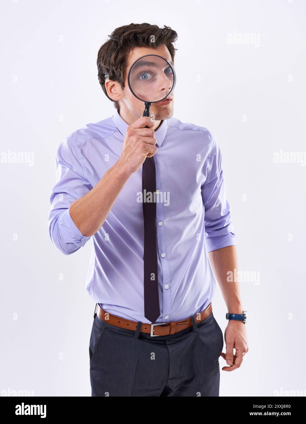 Portrait, face and business man with magnifying glass, investigator and ...