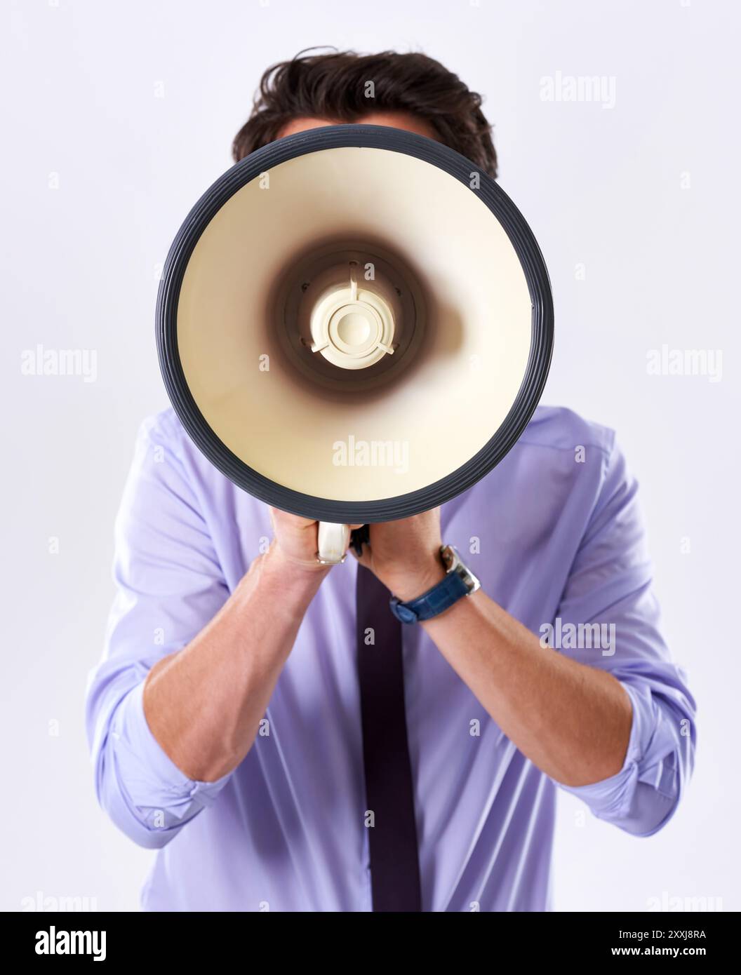 Business man, noise and megaphone in studio for communication ...