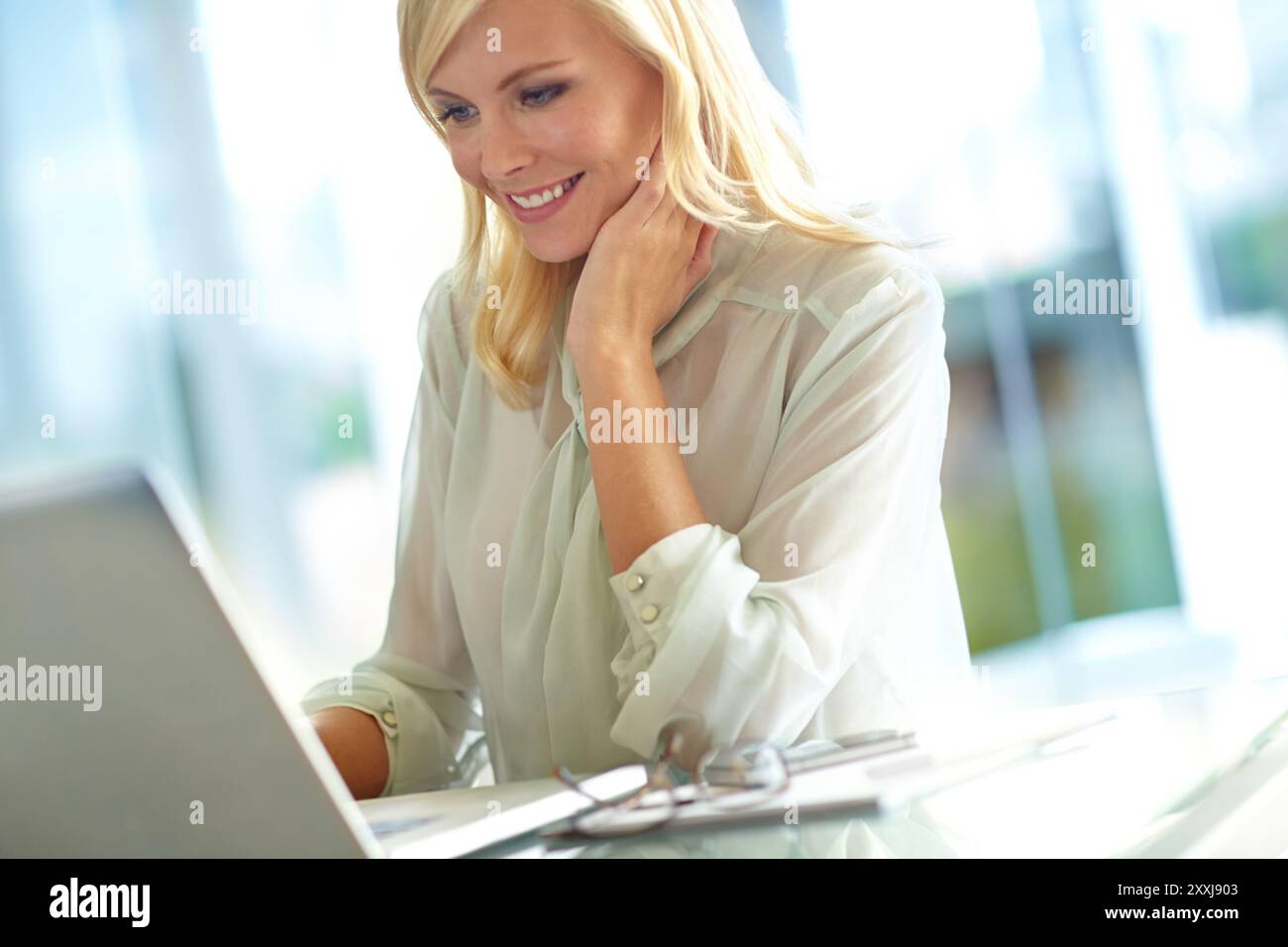 Business, thinking and woman with laptop, typing and connection with ...