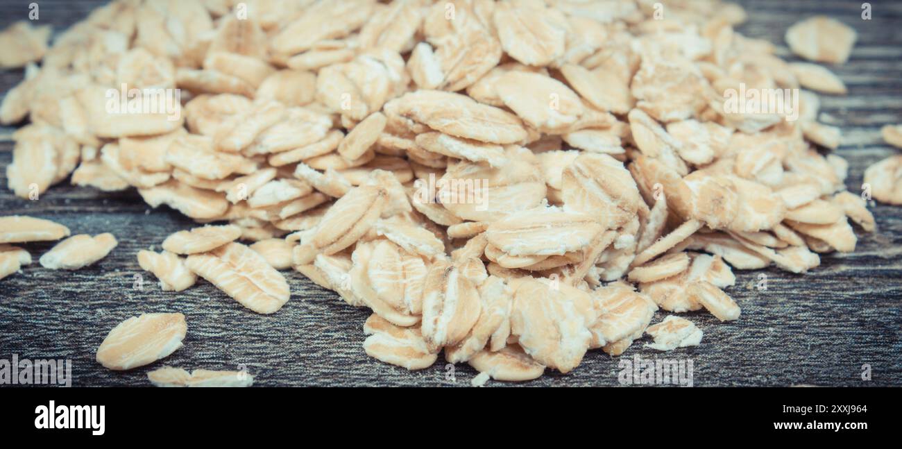 Heap of rye flakes or oat bran containing dietary fiber and natural ...