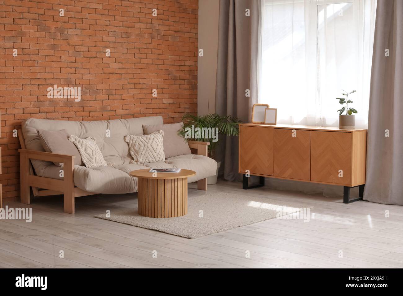 Interior of modern room with sofa and large window Stock Photo - Alamy