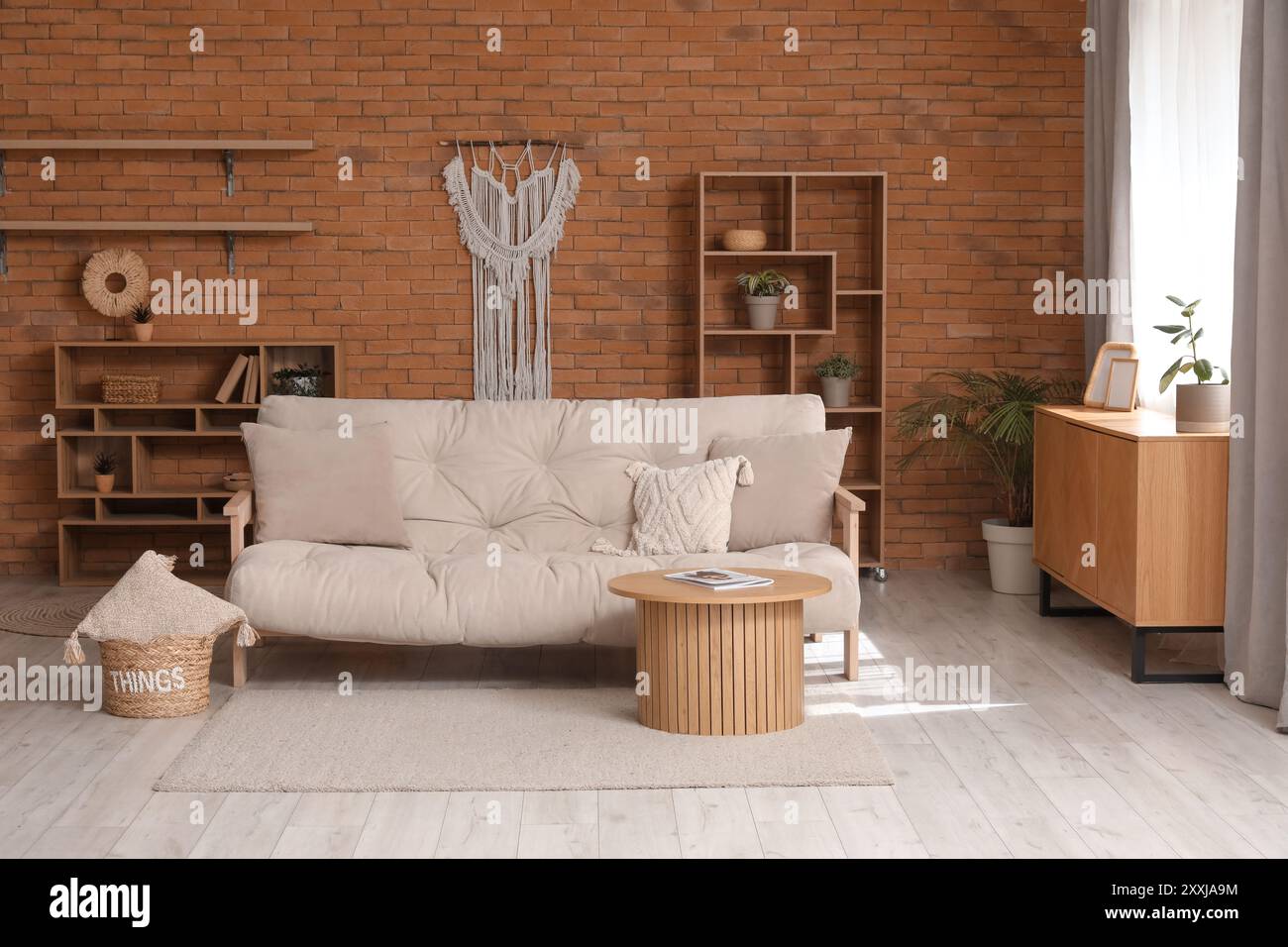 Comfortable sofa and coffee table in interior of living room Stock ...