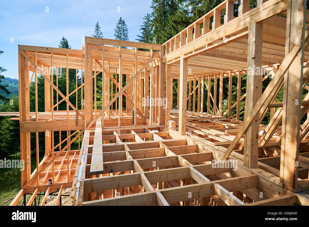 Under-construction residential wooden frame building. Initiation of new ...