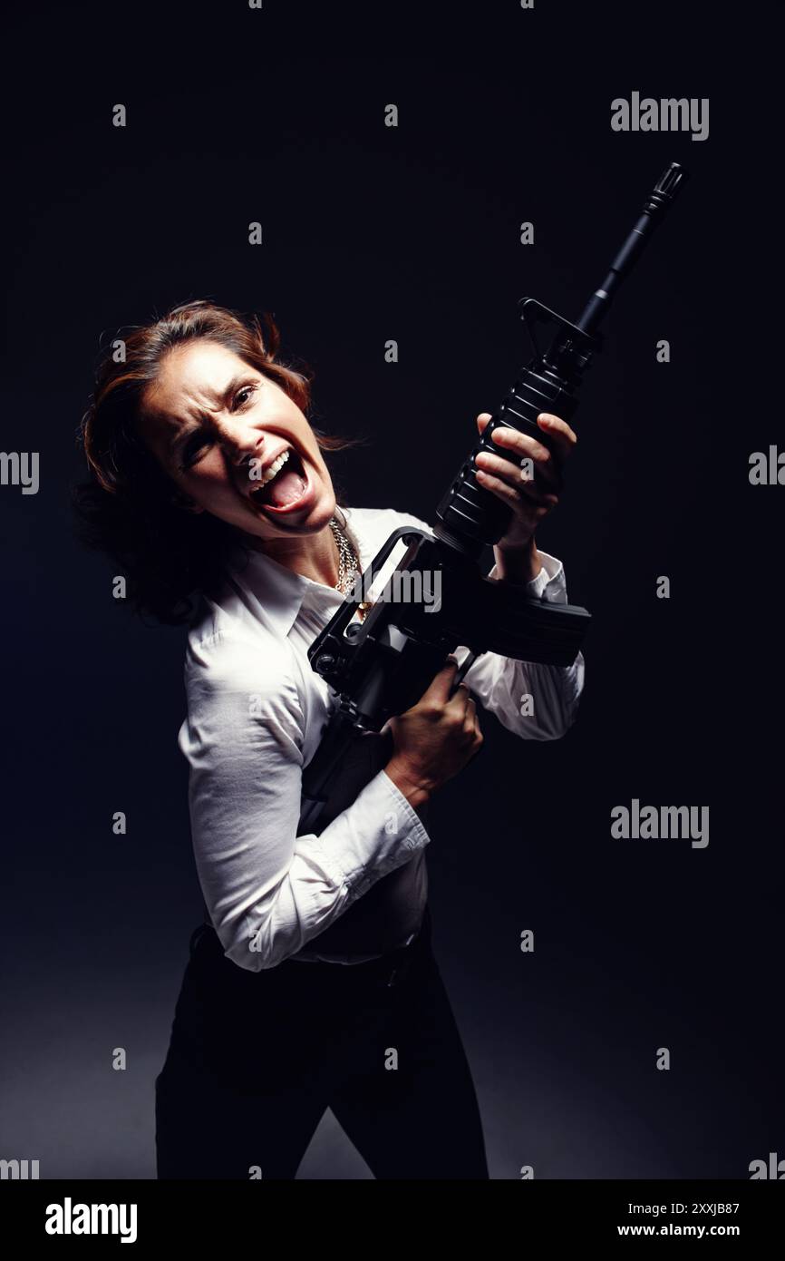 Woman, rifle and professional portrait in studio, angry corporate ...