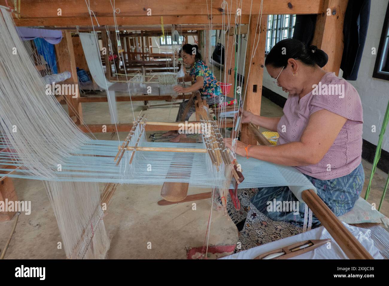 Backstrap weaving at the Mulberry Organic Farm sericulture project, Phonsavan, Xieng Khouang ...