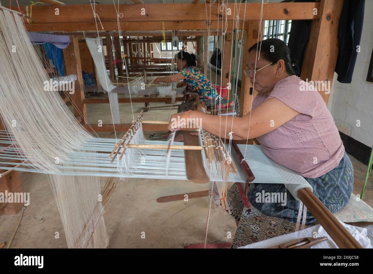 Backstrap weaving at the Mulberry Organic Farm sericulture project ...