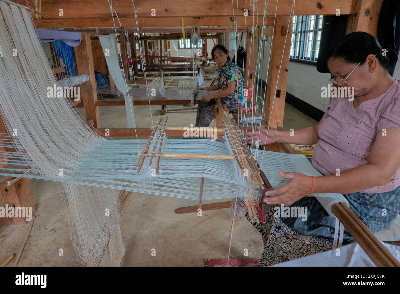 Backstrap weaving at the Mulberry Organic Farm sericulture project ...