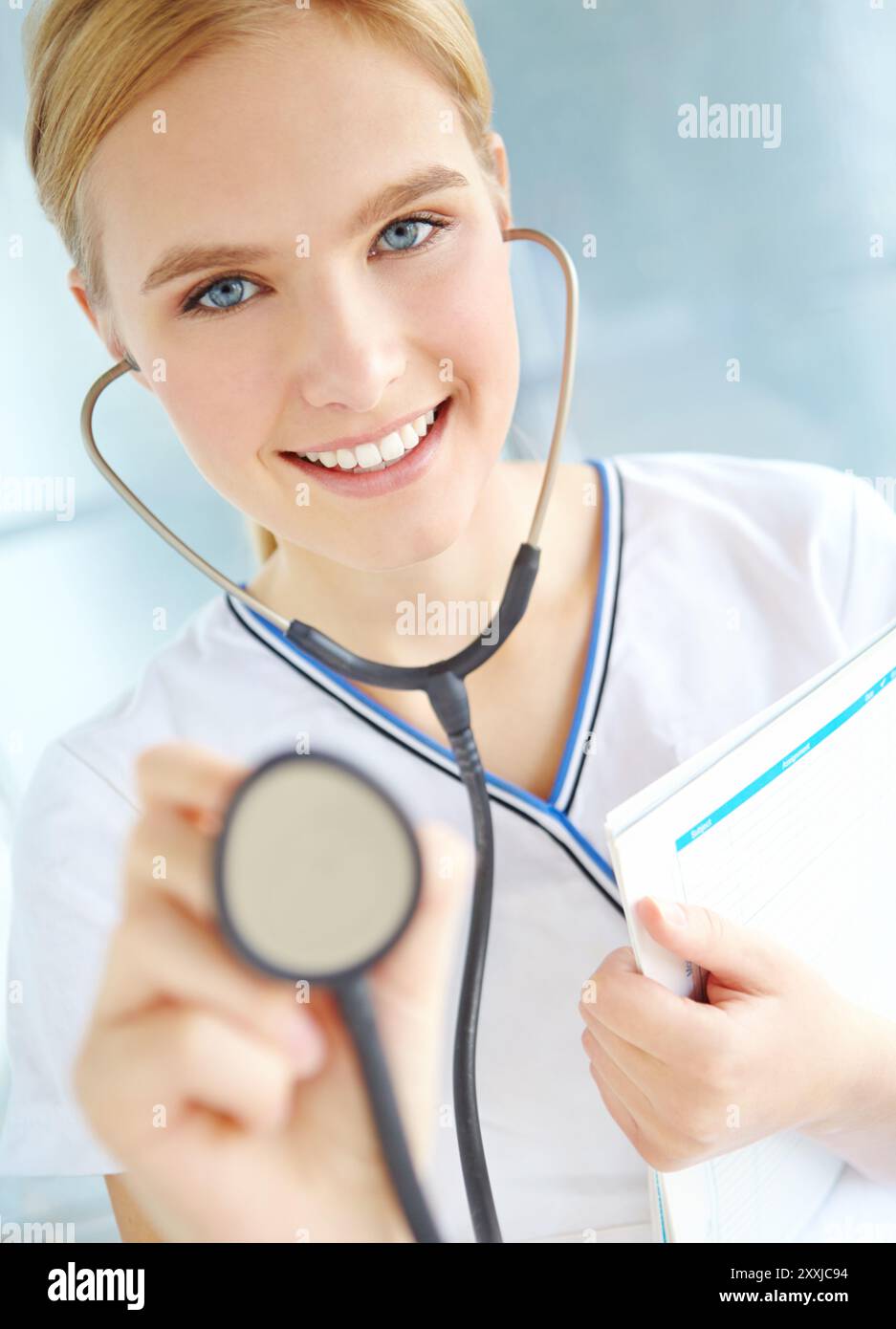 Portrait, woman or doctor in hospital with stethoscope, lungs ...