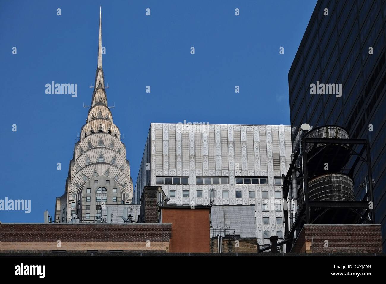 The stylish metal spire of the Chrysler Building, an American Art Deco ...