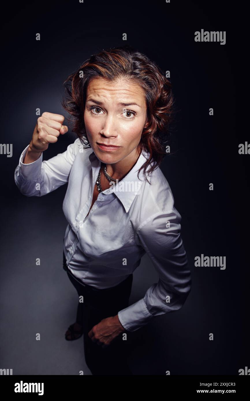 Fist, stop and woman with warning, danger and caution with above ...