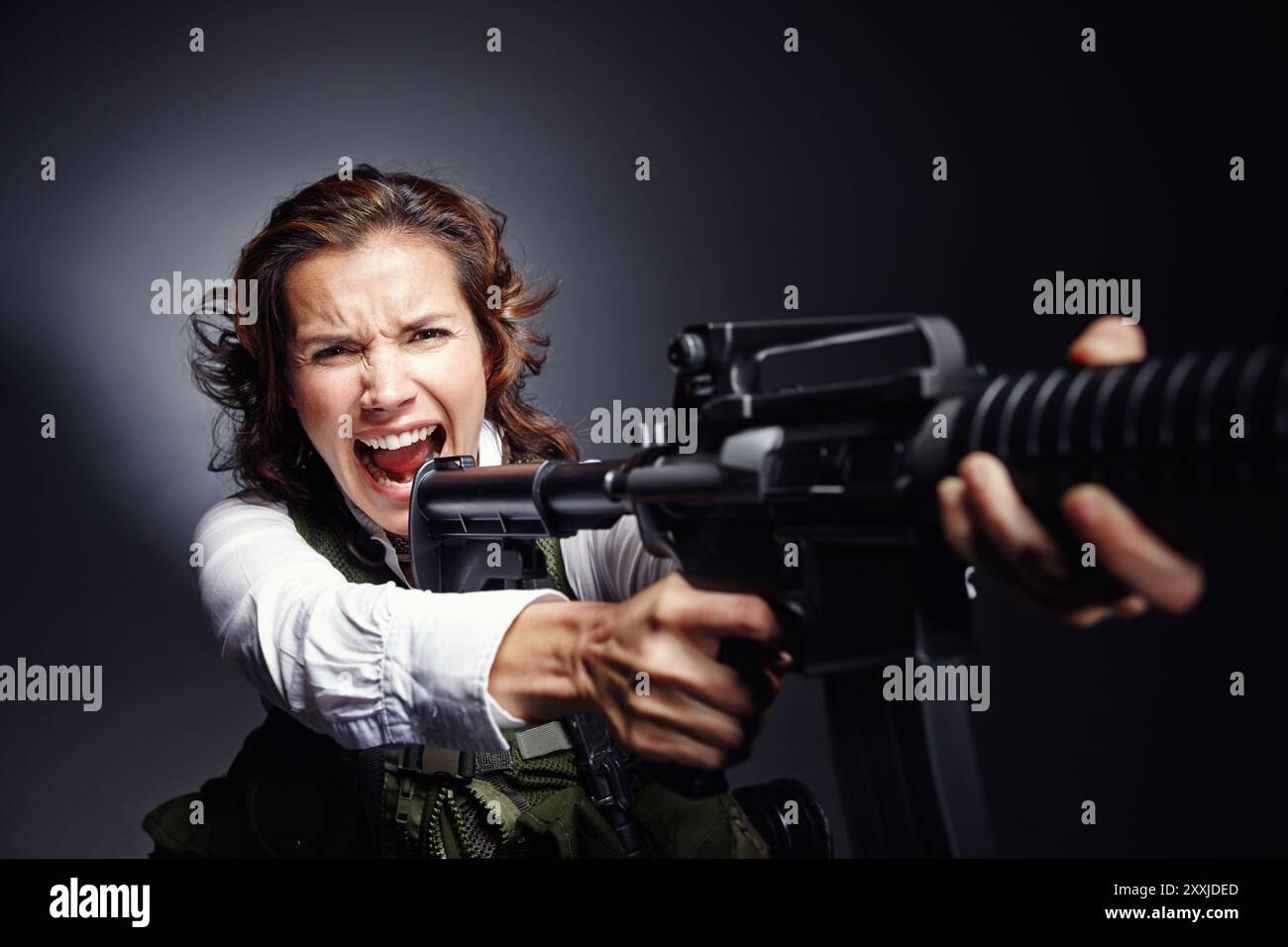 Angry, shooting and woman with gun in studio for secret service ...