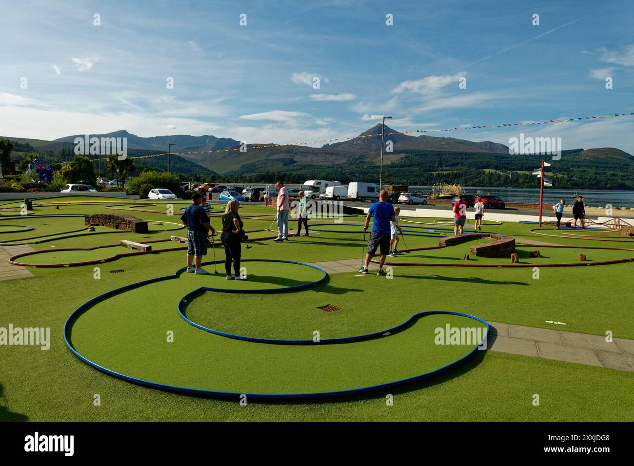 Tourists enjoy crazy golf, Isle of Arran Stock Photo - Alamy