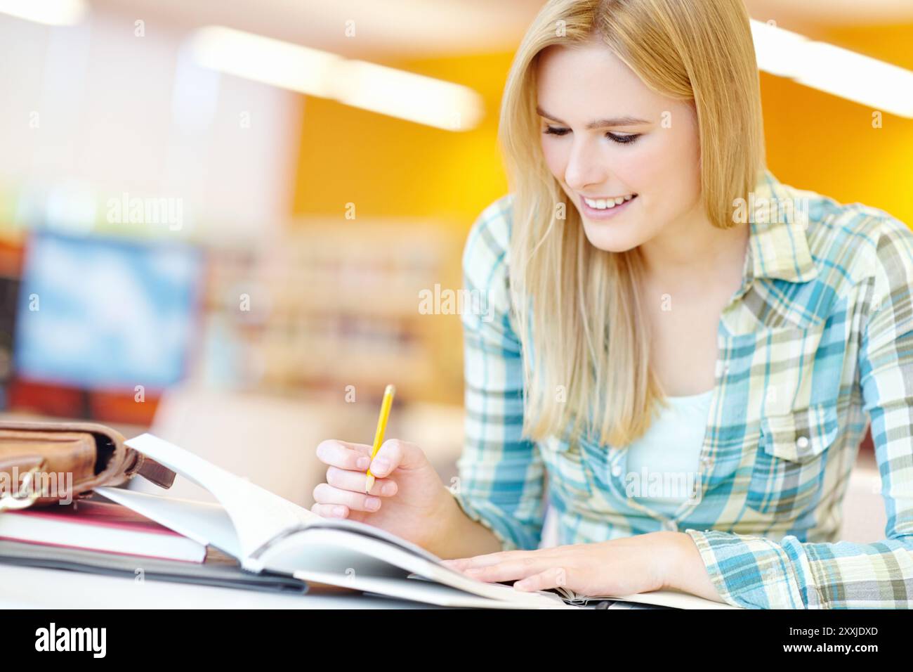 Girl, college student and learning with book at library for research ...