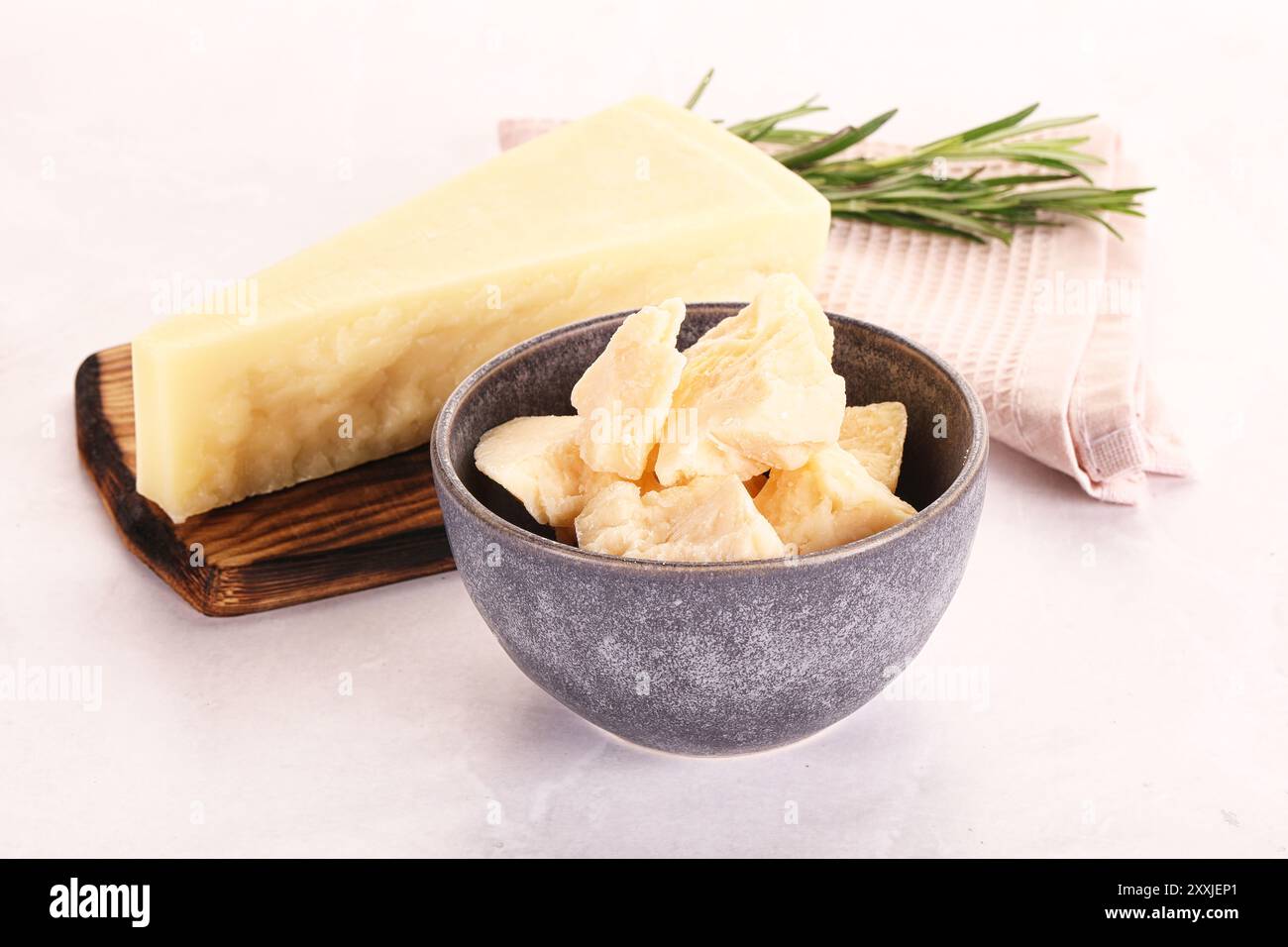 Chopped Italian hard parmesan cheese heap Stock Photo - Alamy