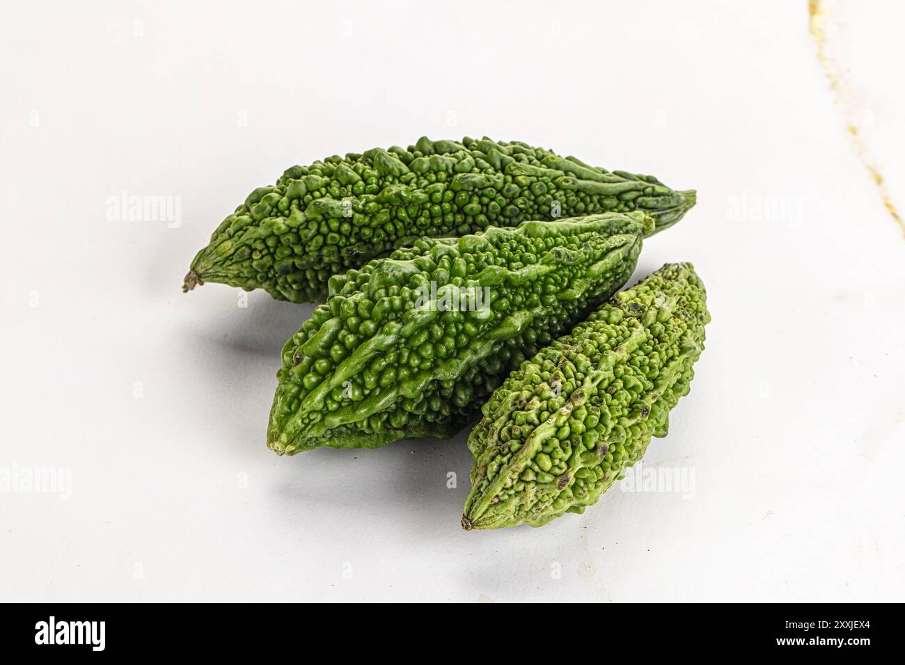 Green raw bitter lemon vegetables heap Stock Photo - Alamy